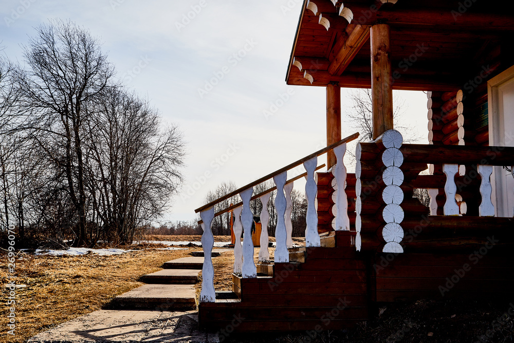 Wooden house with stairs, steps and veranda. Russian ancient ...