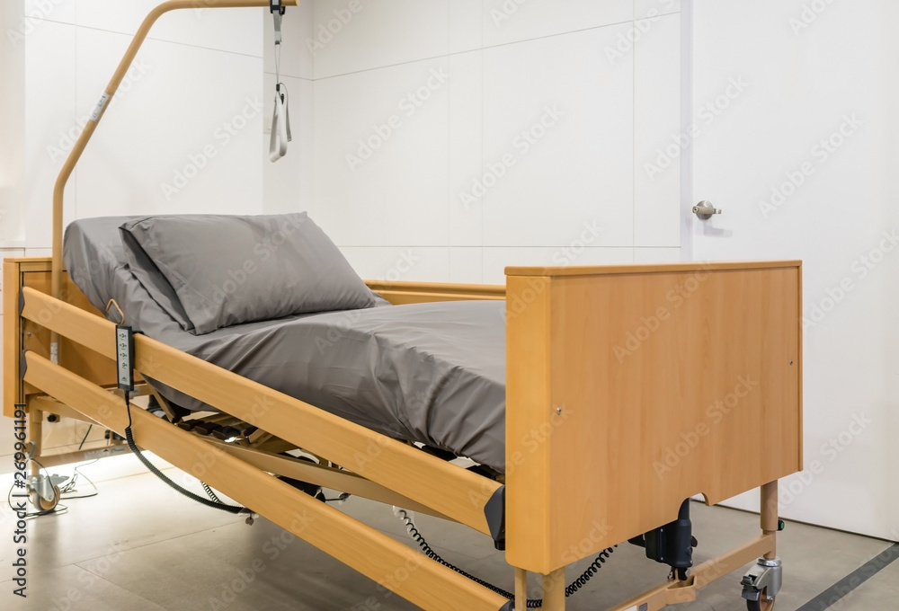 Electrical adjustable patient bed in hospital room. Technology of ...