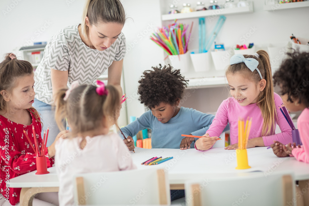 Teacher knows how to turn learning into a fun experience. Stock Photo ...