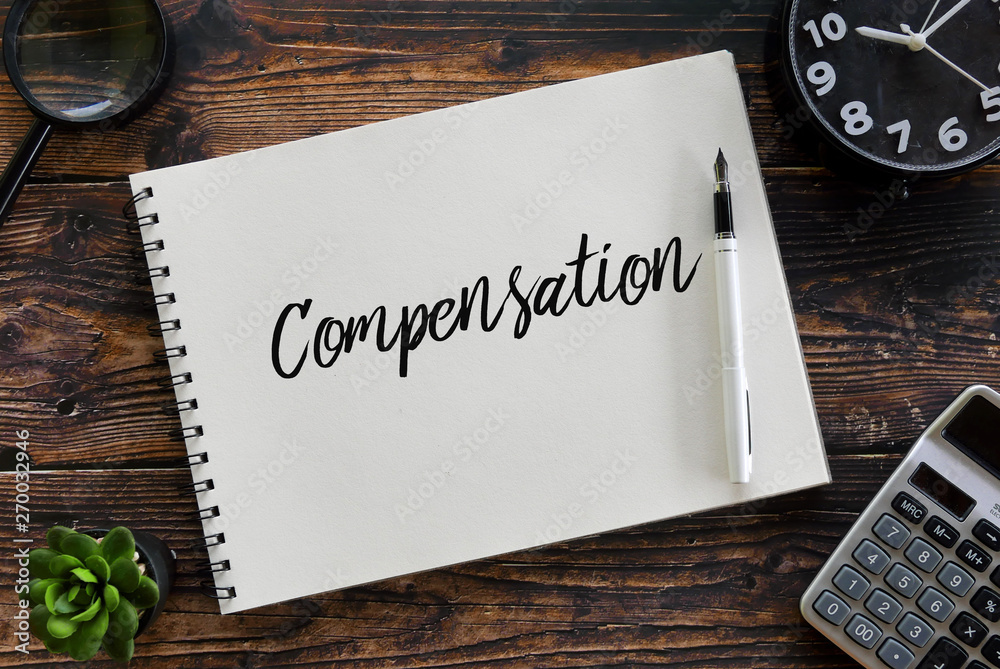 Top view of plant,calculator,clock,magnifying glass,pen and notebook ...