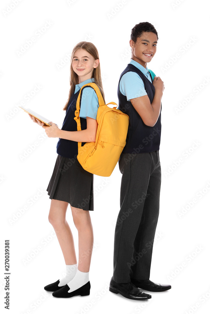Full length portrait of teenagers in school uniform on white background ...