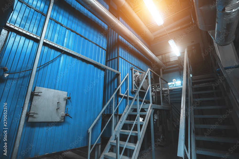 biomass boilers installed in the boiler room. Bottom view. Blue toning ...