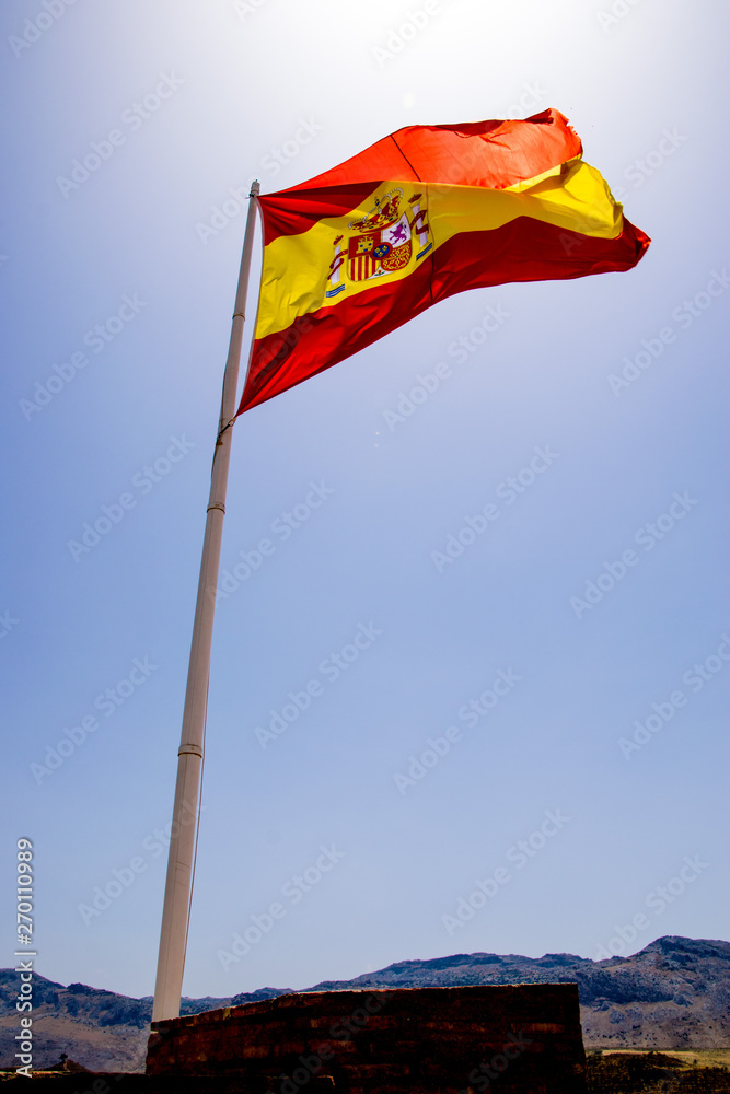 The waving flag of Spain with the sun in the background Stock-Foto ...