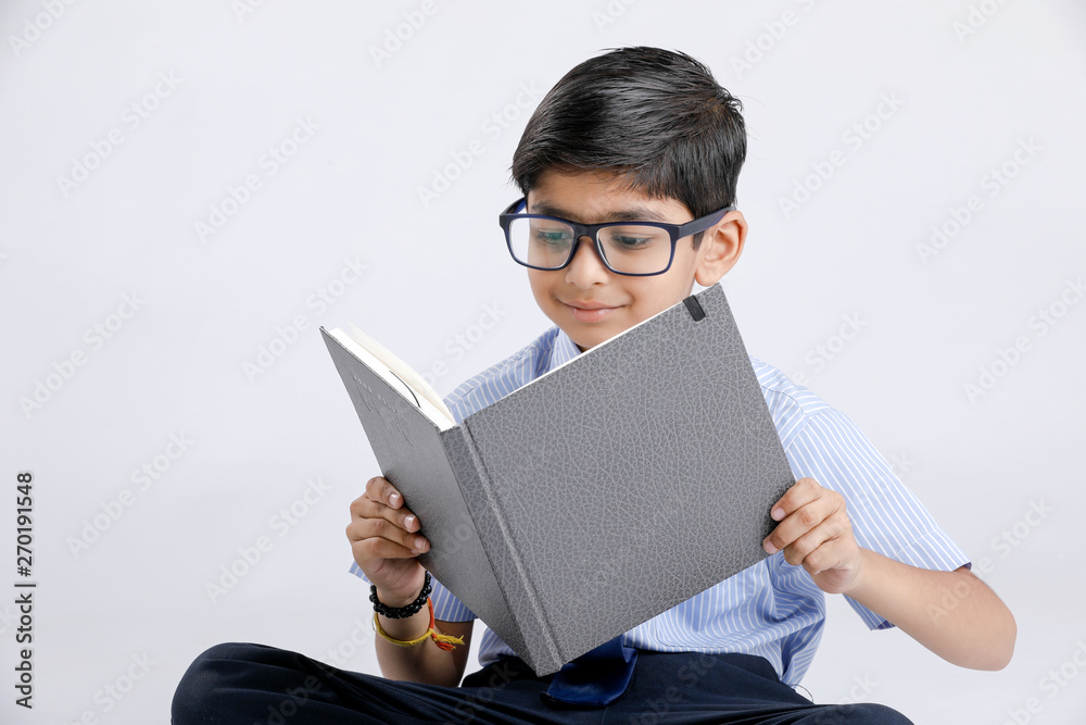 Indian Boy Reading A Book