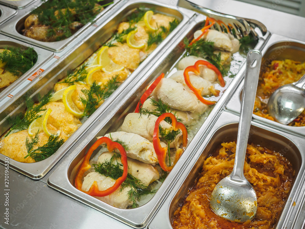 Cuisine cafeteria buffet with food. Self-service food display showcase ...