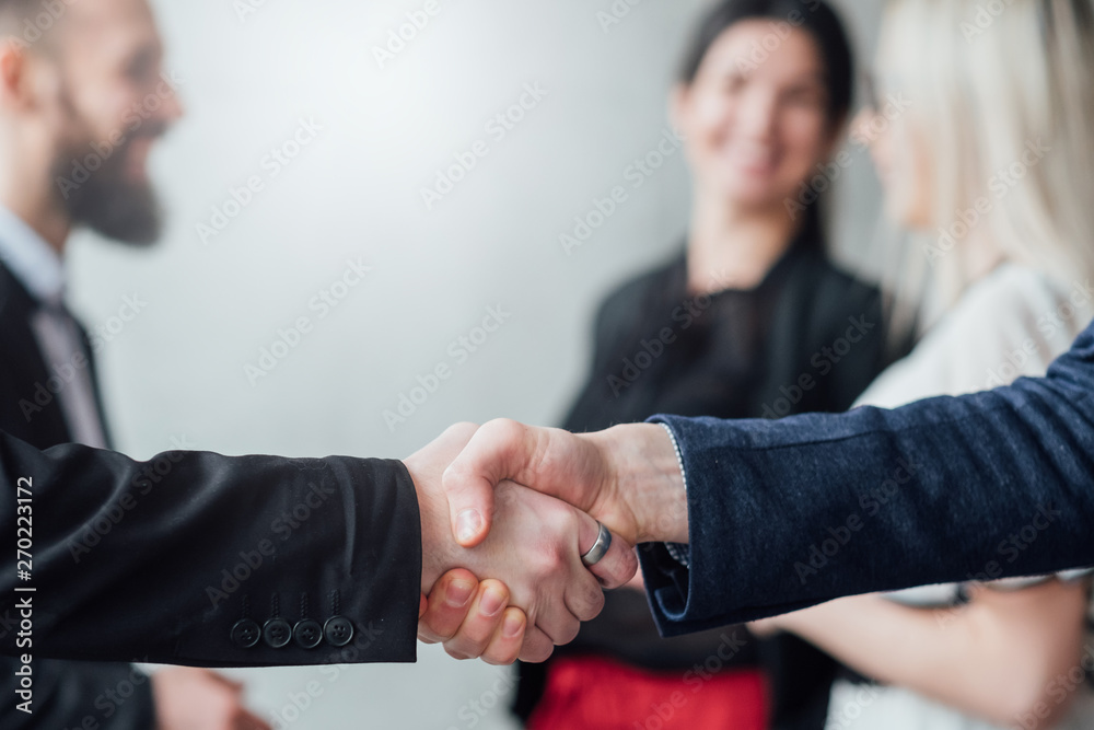 Professional cooperation and agreement. Closeup of handshake ...