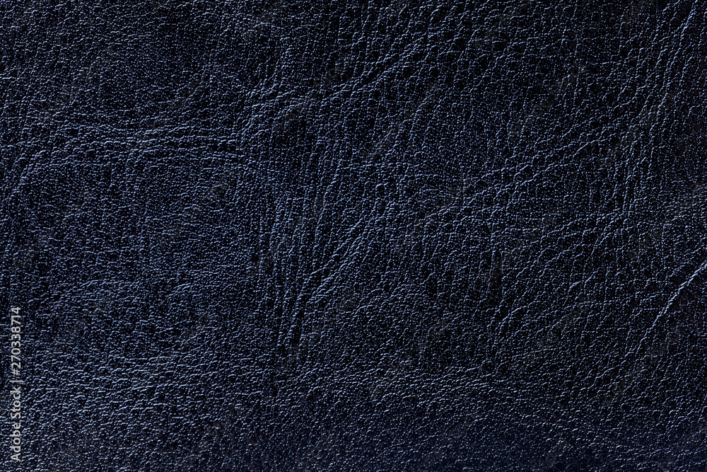 Dark navy blue leather texture background, closeup. Denim cracked ...