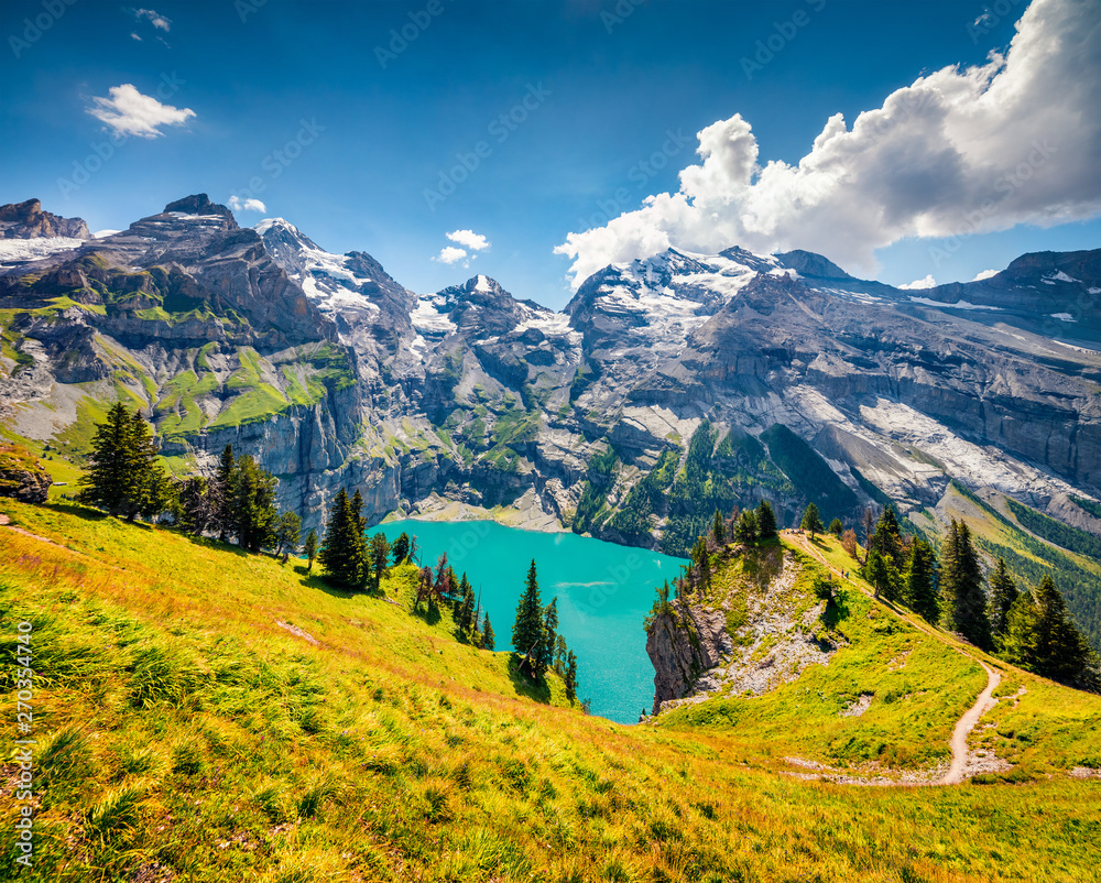 Great summer morning on the unique Oeschinensee Lake. Splendid outdoor ...