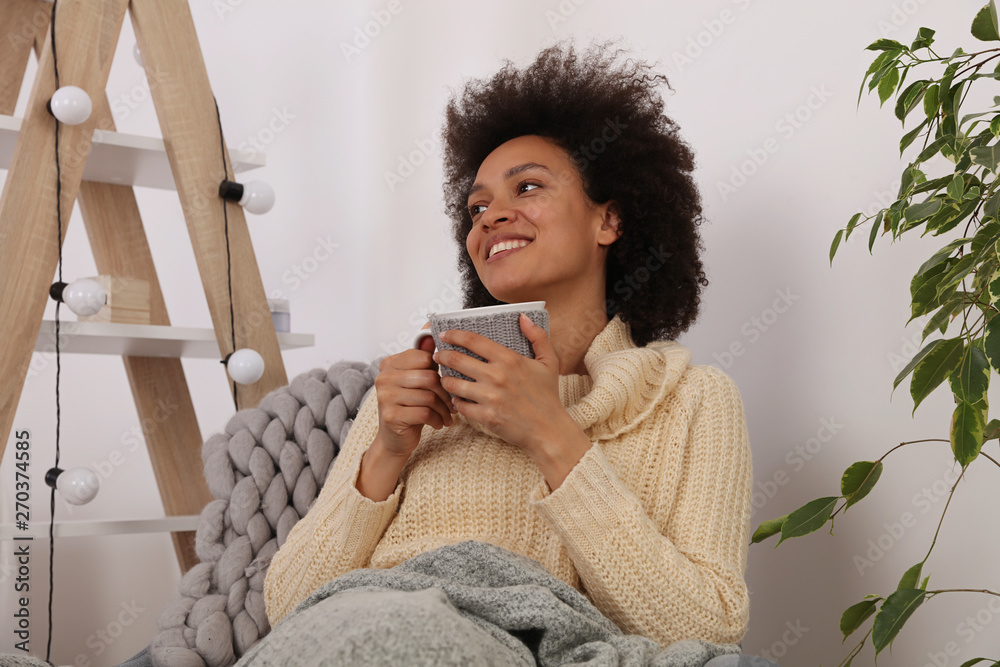 Cozy Home. Woman daydreaming and relaxing at home, drinking coffee ...