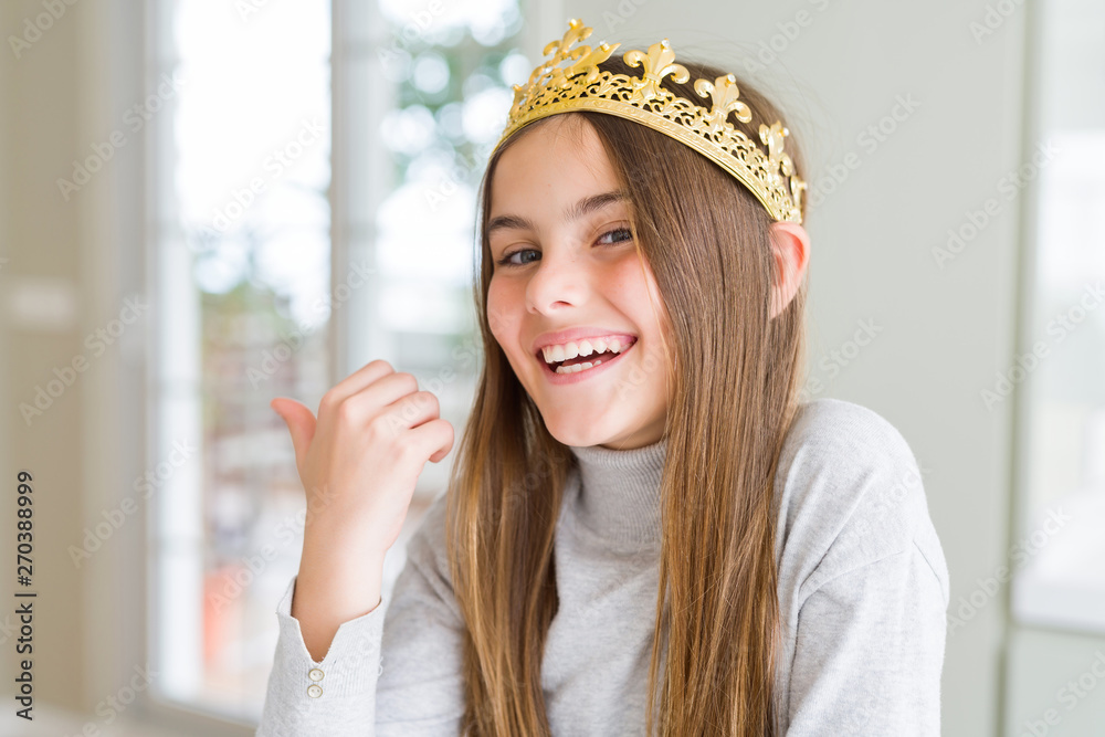 Beautiful young girl wearing a golden crown as a princess from ...