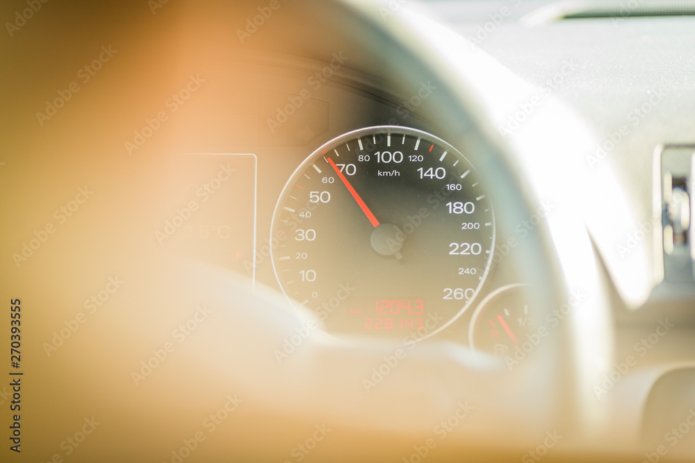 car dashboard and speedometer. kilometer of a car driving at 70, 80, 90 ...