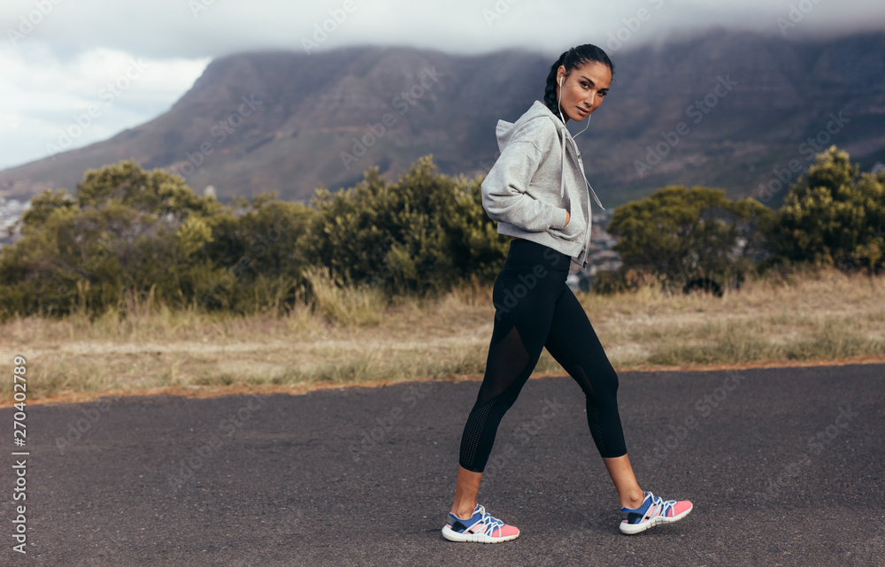 Sports woman on morning walk Stock Photo | Adobe Stock
