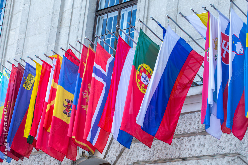 Flags of almost all countries of the northern hemisphere on the facade ...