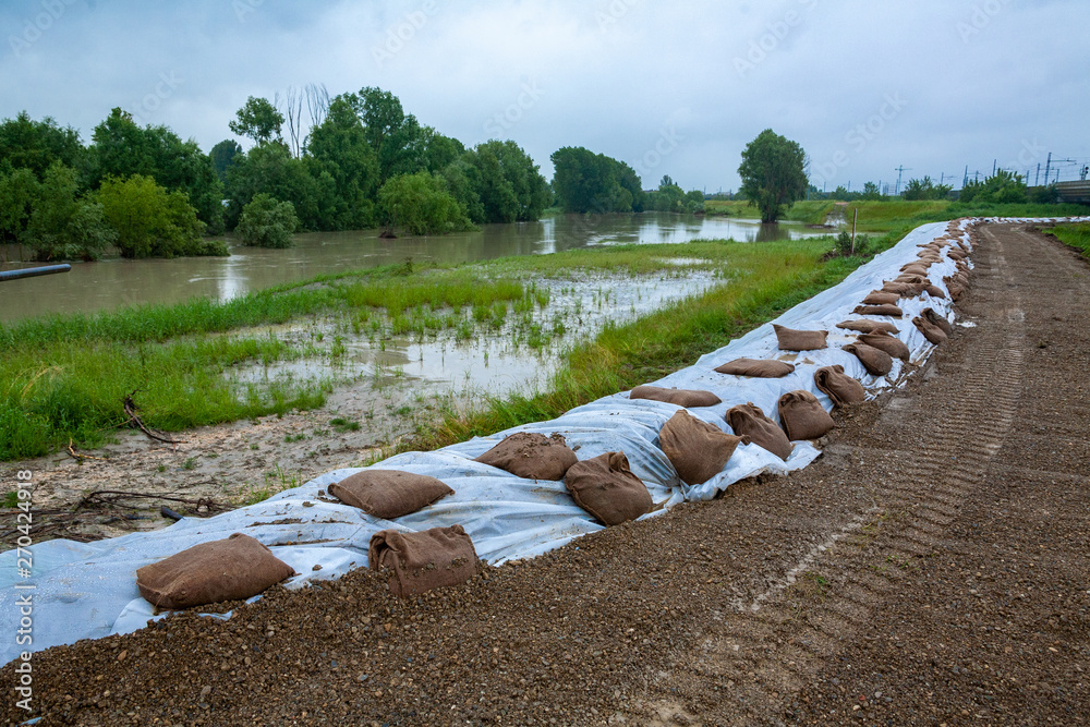 flooding of river embankments reinforcement to delimit the full emilia ...