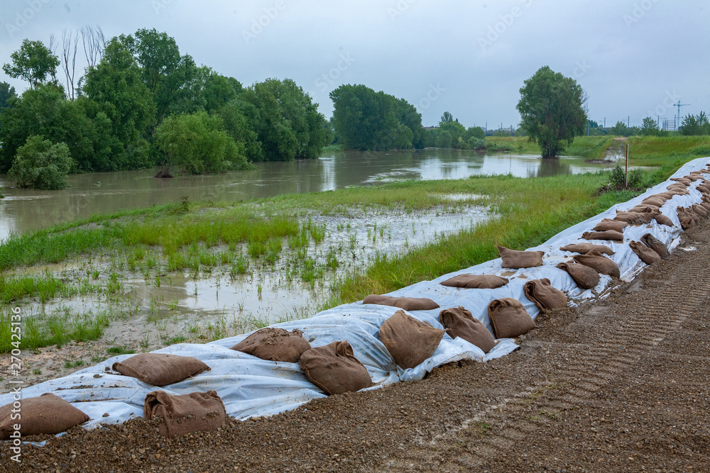 flooding of river embankments reinforcement to delimit the full emilia ...