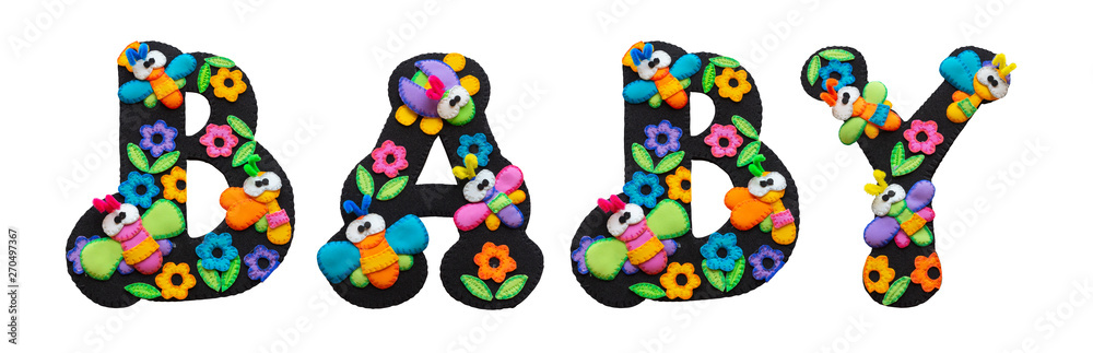 BABY word formed with letters made in black foamy decorated with toy ...
