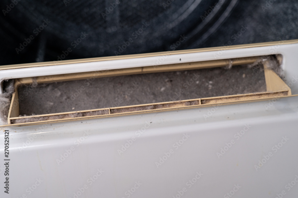 Dirty and clogged lint screen from a dryer Stock Photo | Adobe Stock