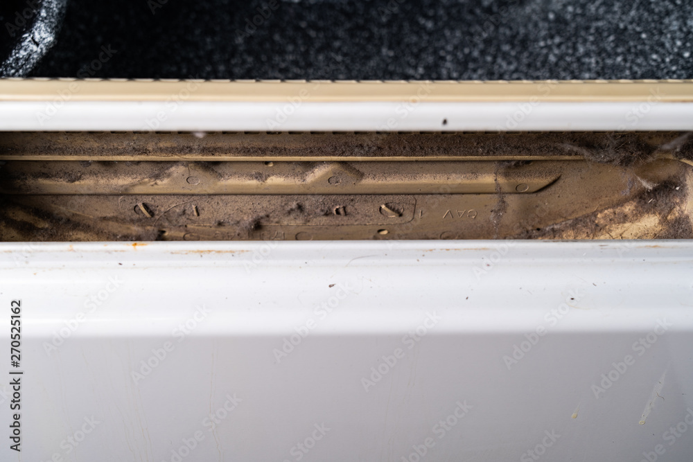 Lint accumulates in the space behind the lint screen in a drier Stock ...