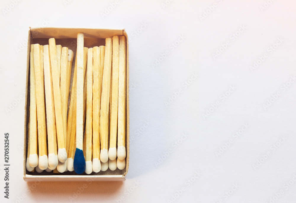 White matches and one match of blue color in a box. Self respect and ...