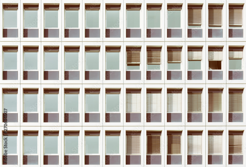 Windows of apartment block creating repetitive pattern Stock Photo ...