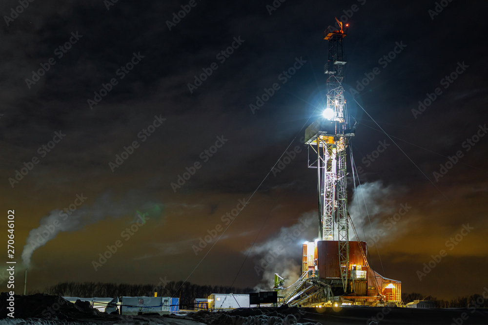 The beautiful sunrise landscape of Drilling rig in onshore oilfield of ...