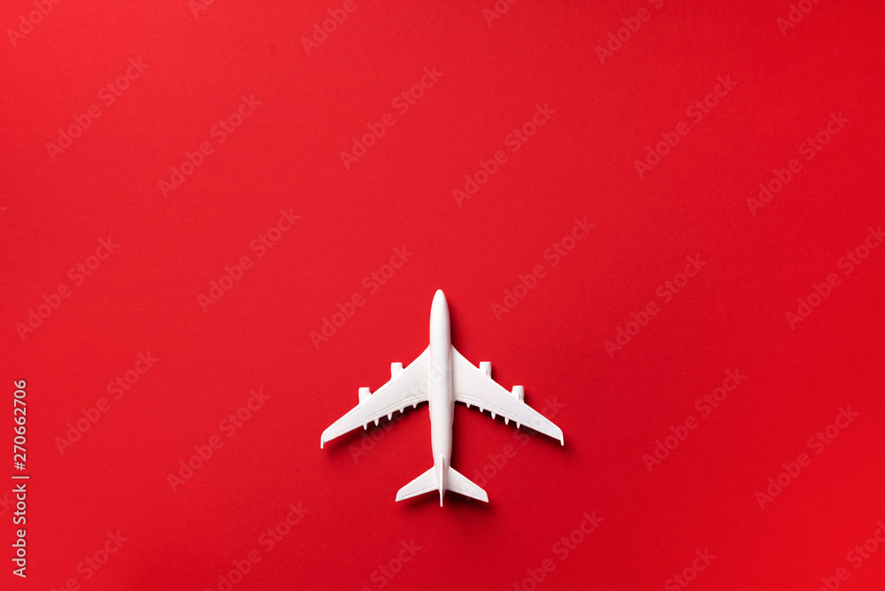 Creative layout. Top view of white model plane, airplane toy on pink ...