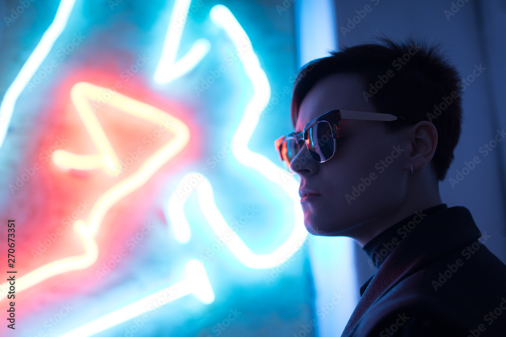 lesbian woman in blue neon lights Stock Photo | Adobe Stock