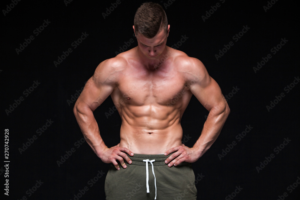 Strong Athletic Man - Fitness Model showing his perfect body isolated ...