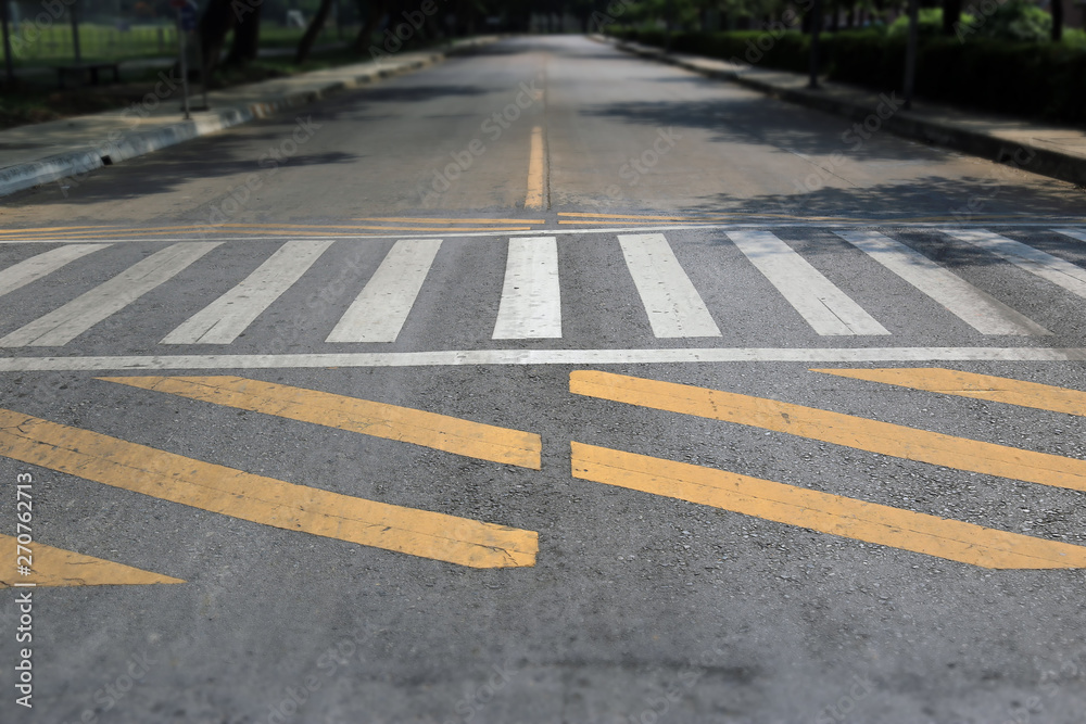Crosswalk street in urban area with flare of sun light, Zebra crosswalk ...