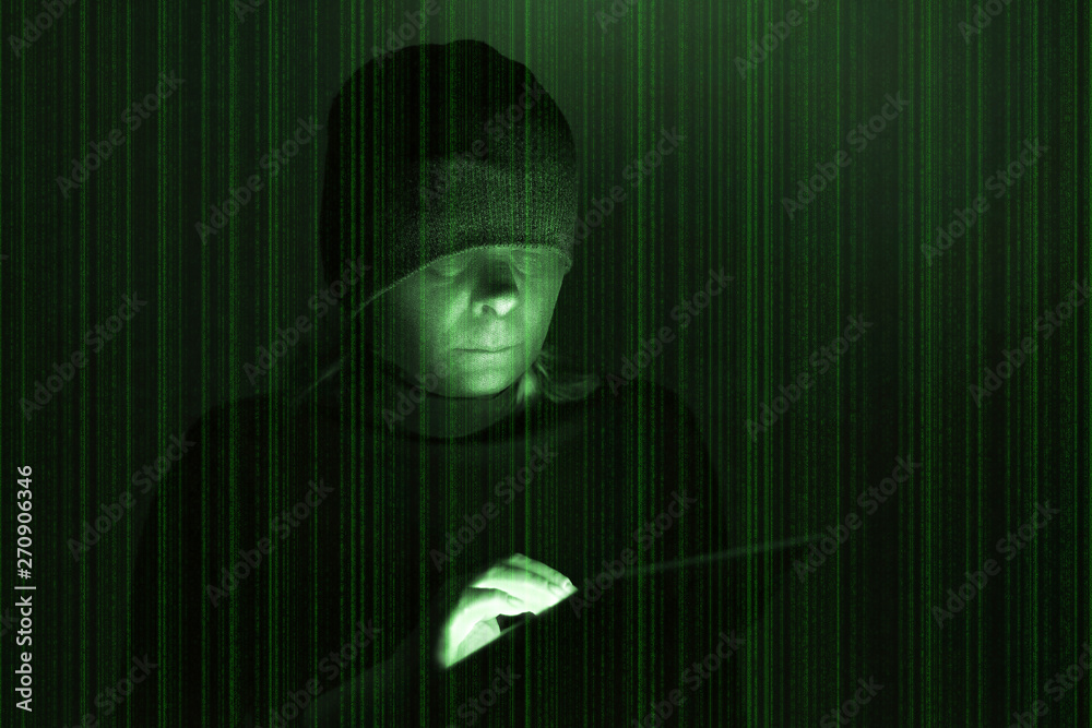 Female hacker with black knit hat and black tights over her head ...