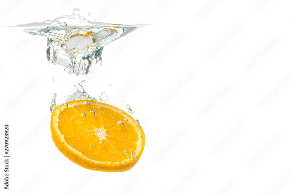 Orange fruit slice in water splash Stock Photo | Adobe Stock