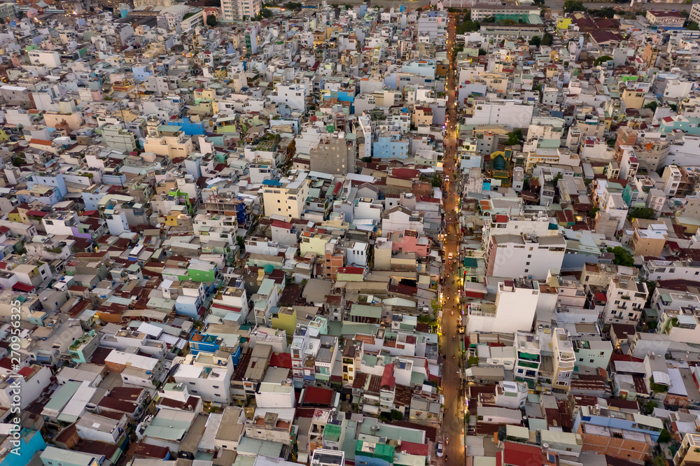 aerial top down view of densely populated urban area featuring roof ...
