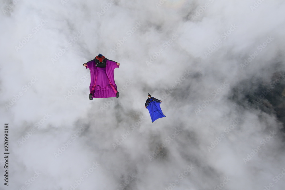 Wingsuit skydiving over Norway Stock Photo | Adobe Stock