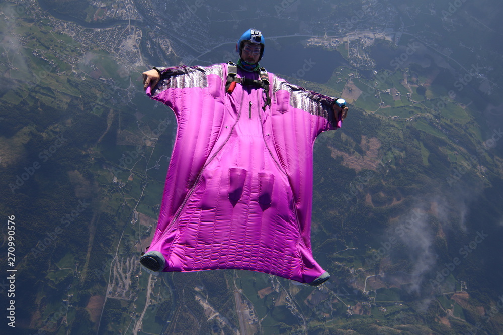 Wingsuit skydiving over Norway Stock Photo | Adobe Stock