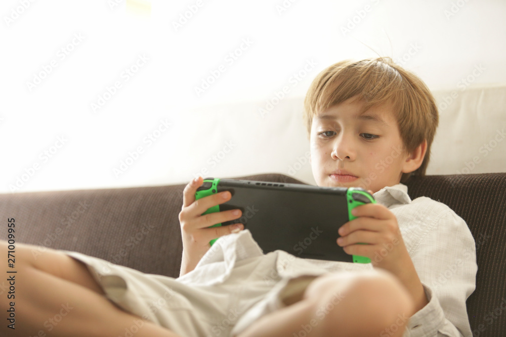boy, kid, playing games with differen poses and attitudes, gamepad ...