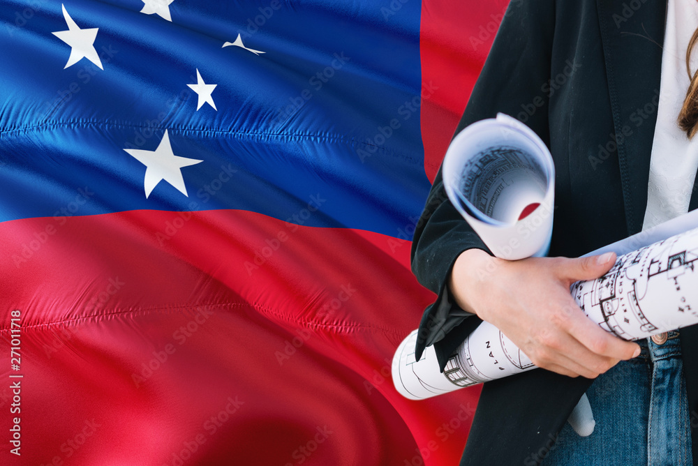 Samoan Architect woman holding blueprint against Samoa waving flag ...