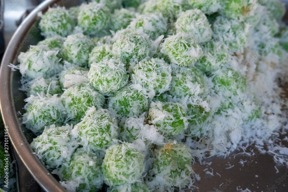 Malay traditional food with multicolor and flavor display in a ...