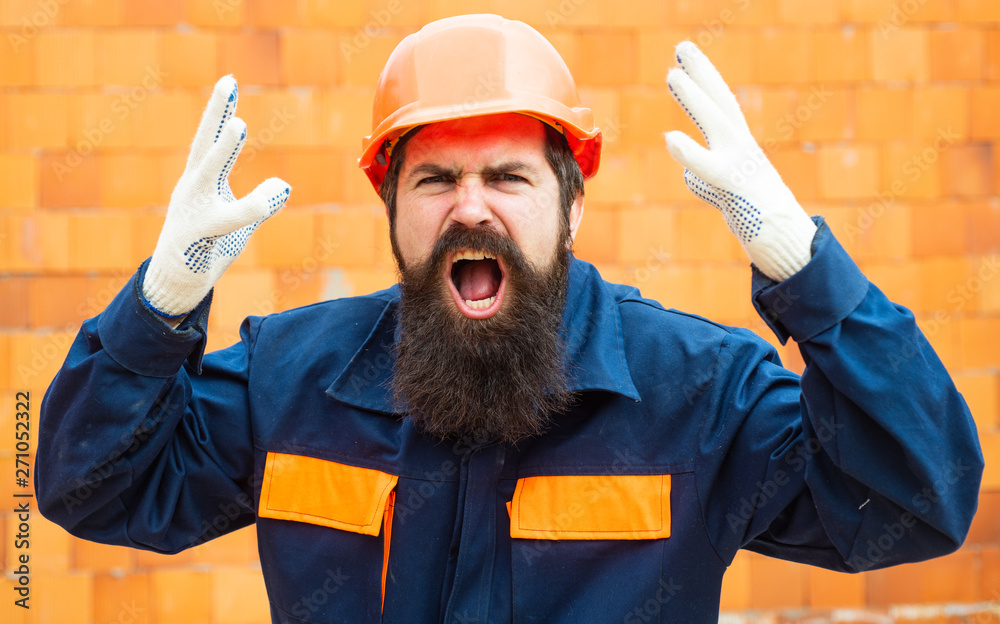 Angry builder. Incident at a construction site. Safety rules for ...