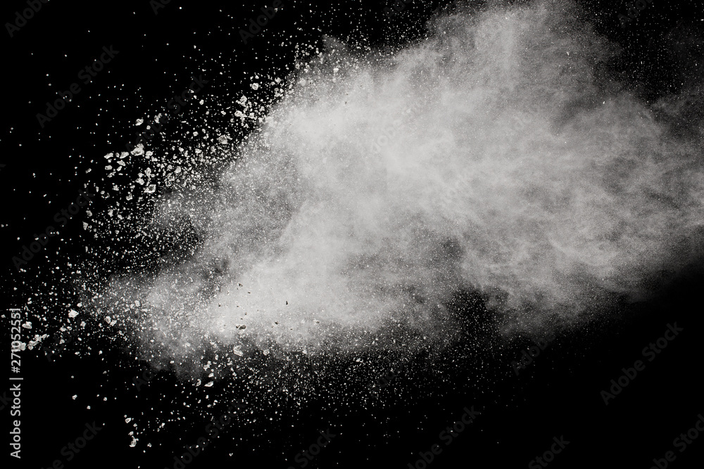 Bizarre forms of white powder explosion cloud against black background ...