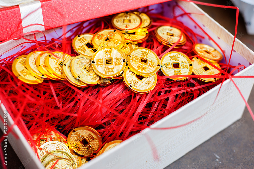 Chinese ancien gold coins in a box, the wording on golden coin is ...