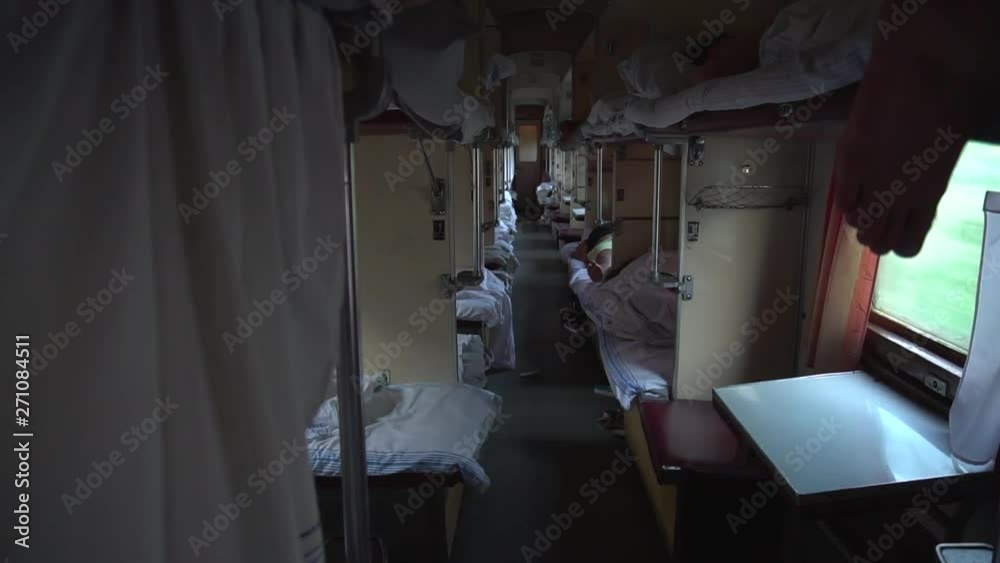 Ukrainian second class train sleeping carriage. Dark and then sun comes ...