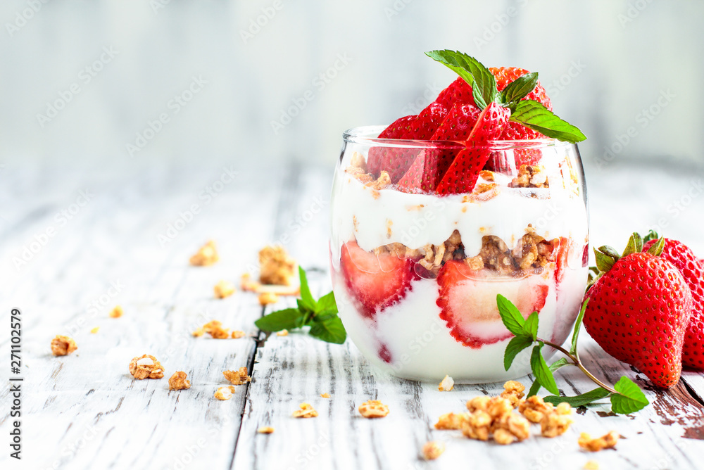 Healthy breakfast of strawberry parfaits made with fresh fruit, yogurt ...