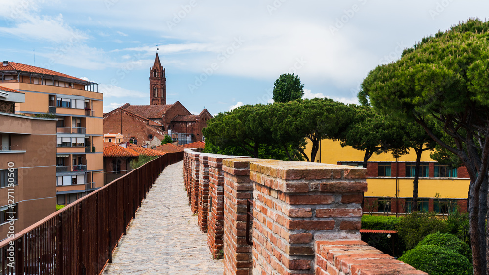 View from the scenic Ancient Walls of Pisa Walkway on a sunny summer ...