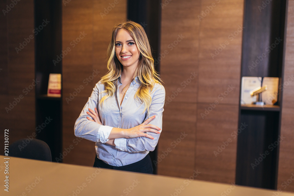 Foto de Picture of pretty receptionist at work do Stock | Adobe Stock
