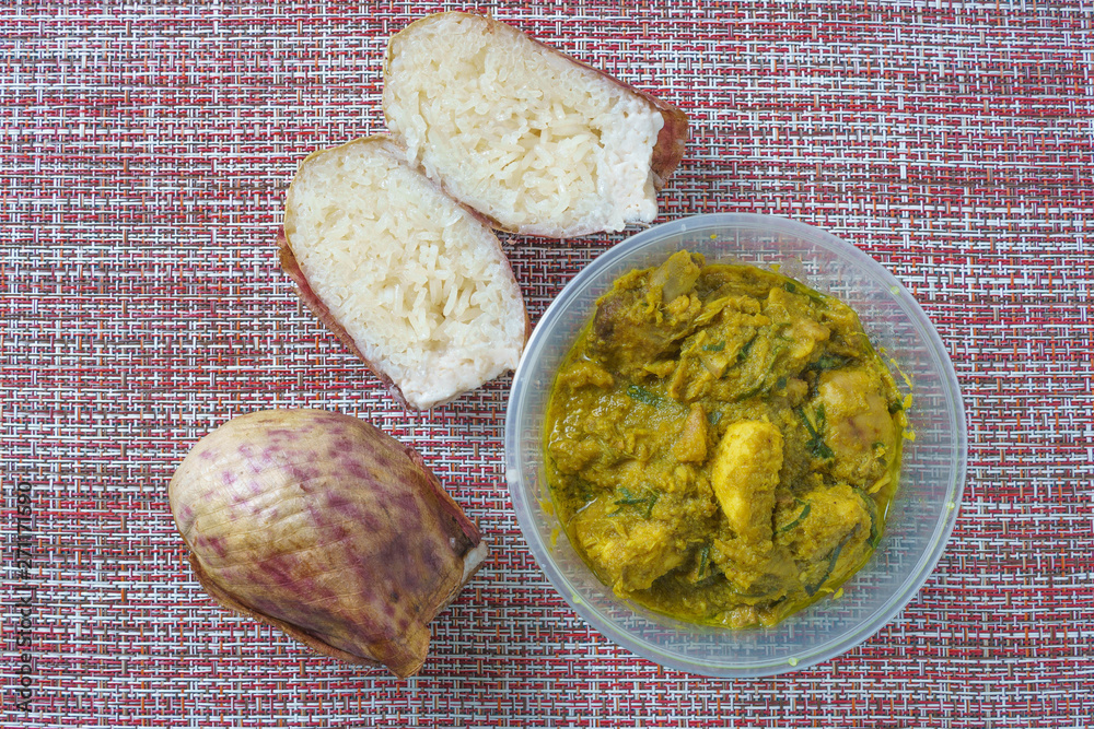 Glutinous rice or Lemang Periuk Kera cooked in pitcher plant leaves and ...