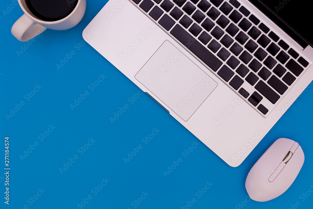 flat lay Office desk table of modern workplace with laptop on blue ...