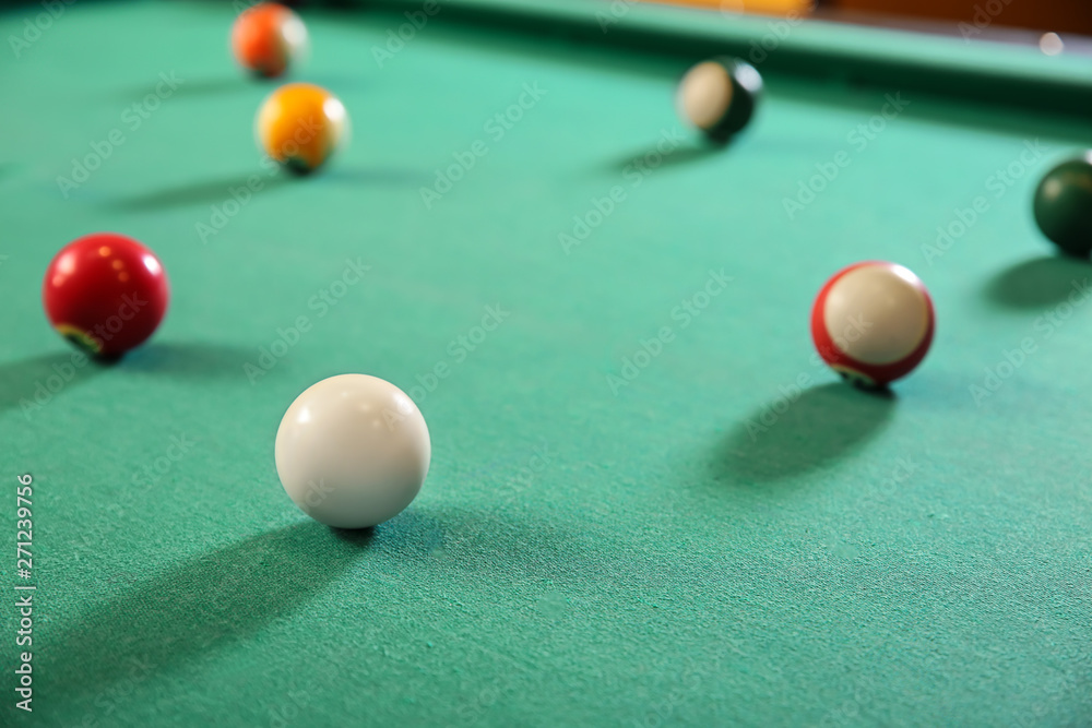 Billiard balls on table in club Stock Photo | Adobe Stock