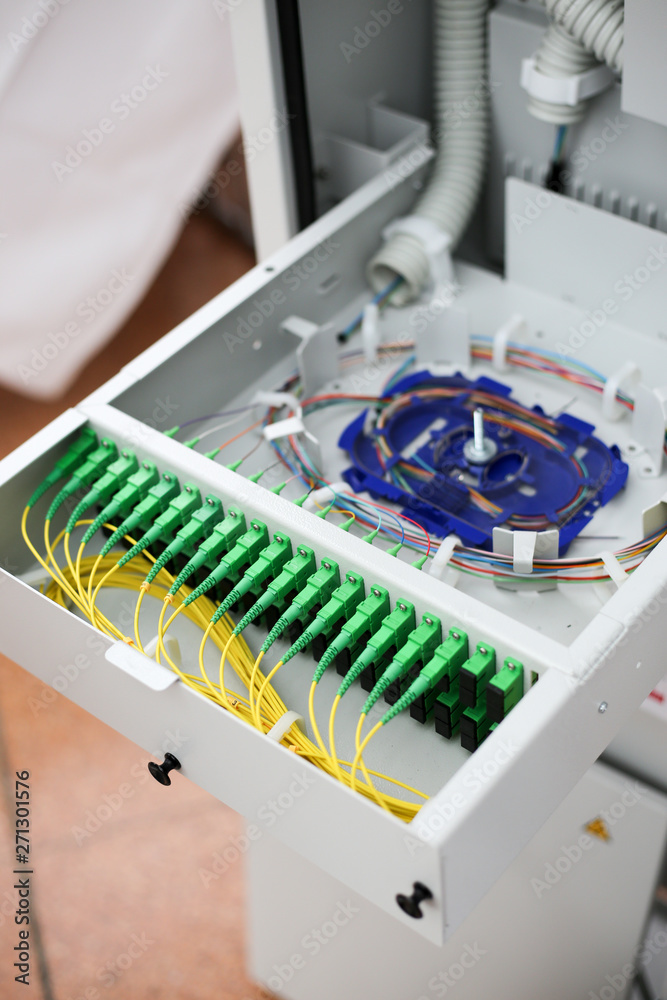 Fiber to the home equipment. FTTH internet fiber optics cables and ...