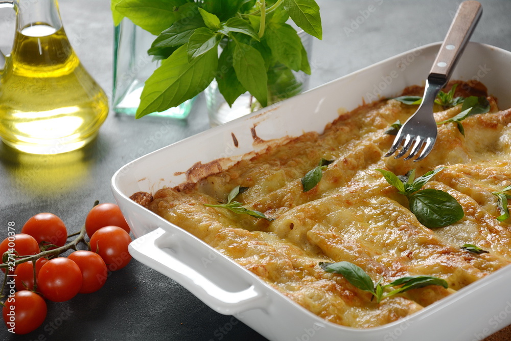 Cannelloni pasta stuffed with spinach, mushrooms,ricotta and sauce ...
