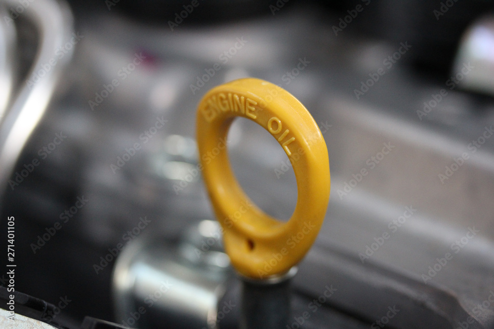 Vehicle engine dipstick Stock Photo | Adobe Stock